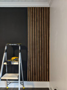 HOW TO MAKE AN AFFORDABLE WOOD SLAT WALL - Simply Aligned Home