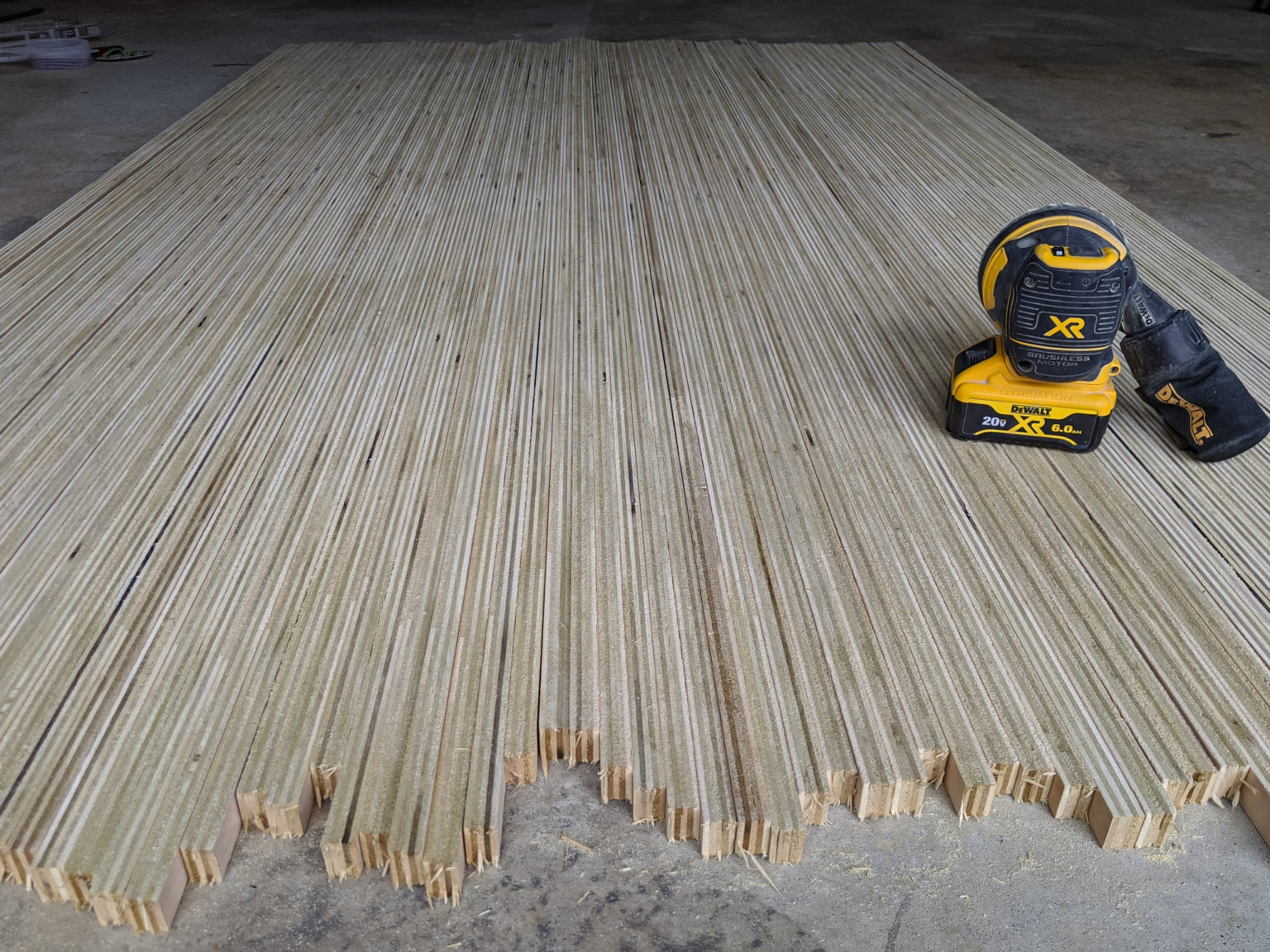 HOW TO MAKE AN AFFORDABLE WOOD SLAT WALL - Simply Aligned Home