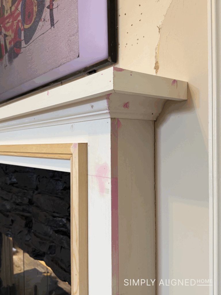 How to Update a Fireplace Surround with Wood and Trim - Simply Aligned Home