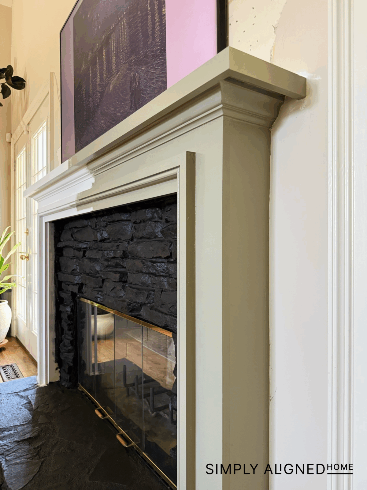 How to Update a Fireplace Surround with Wood and Trim - Simply Aligned Home